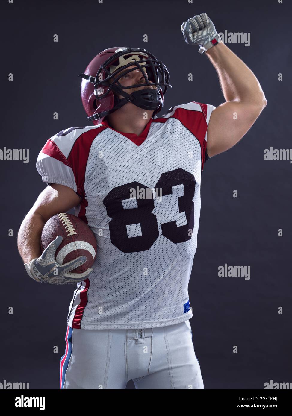 american football player celebrating touchdown isolated on gray ...