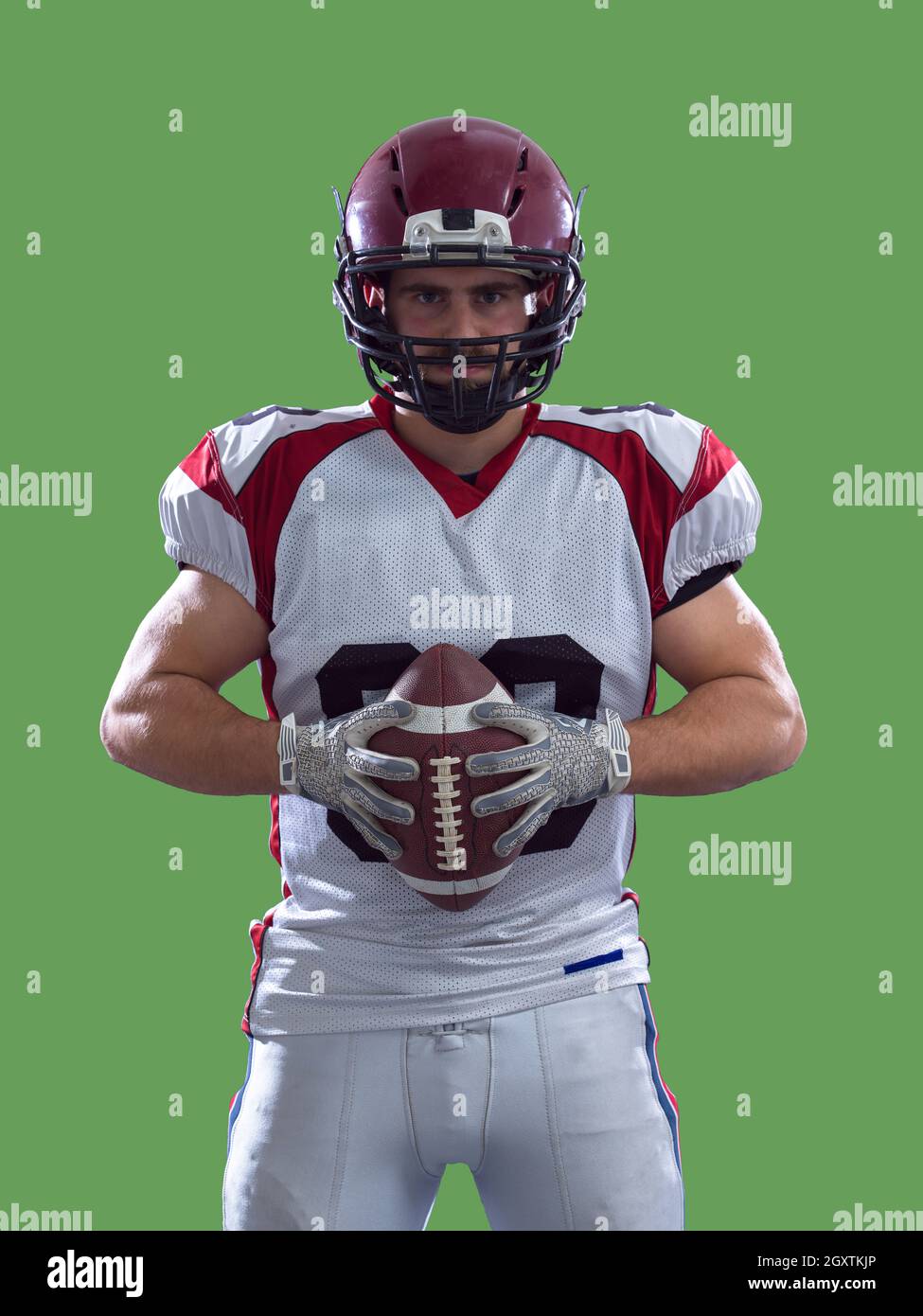 Portrait of a strong muscular American Football Player isolated on ...