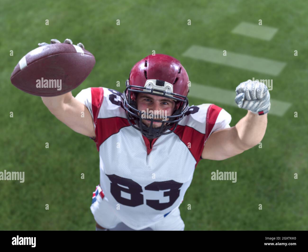 american football player celebrating touchdown isolated on stadium ...