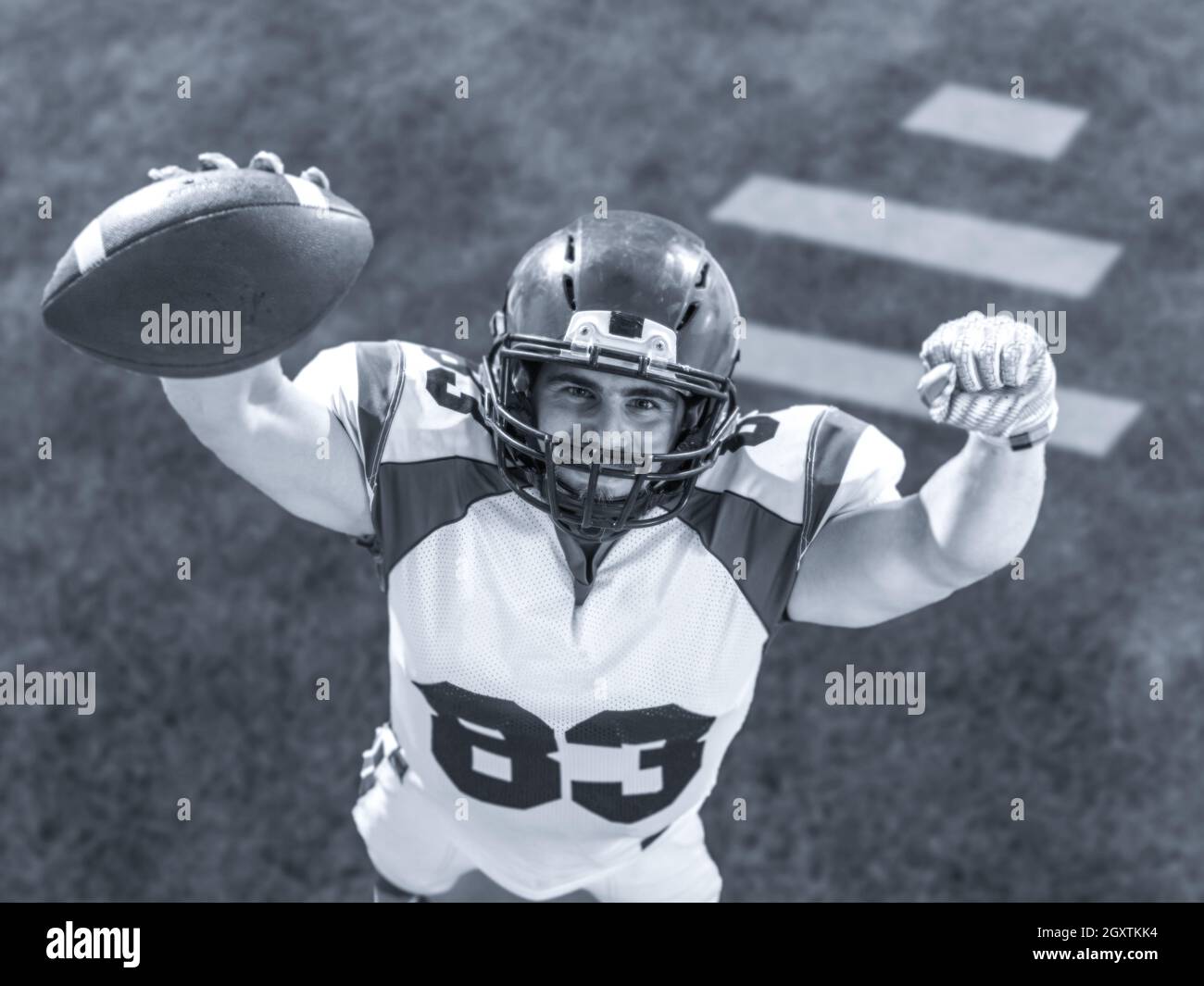 american football player celebrating touchdown isolated on stadium ...