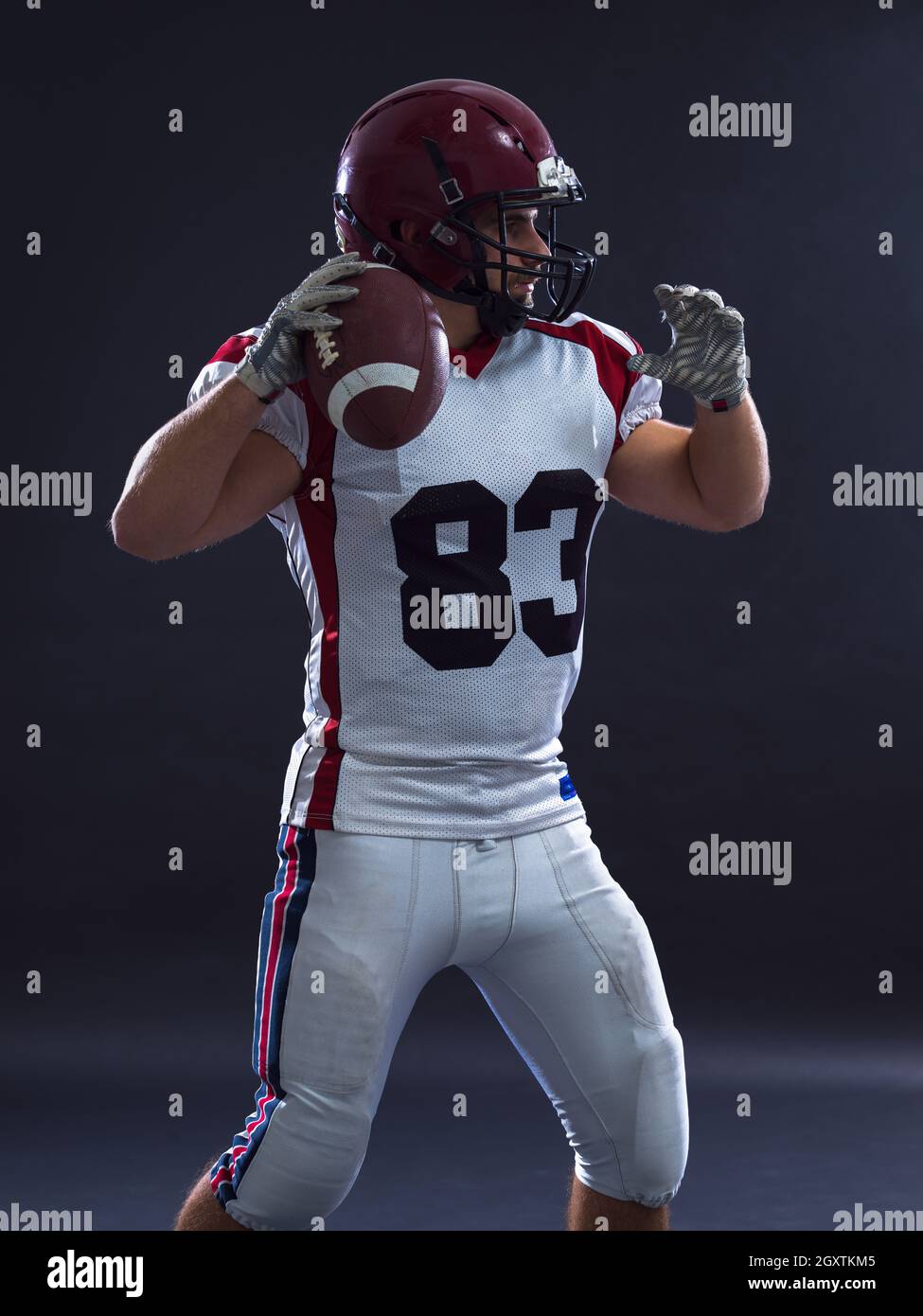 one quarterback american football player throwing ball isolated on gray ...