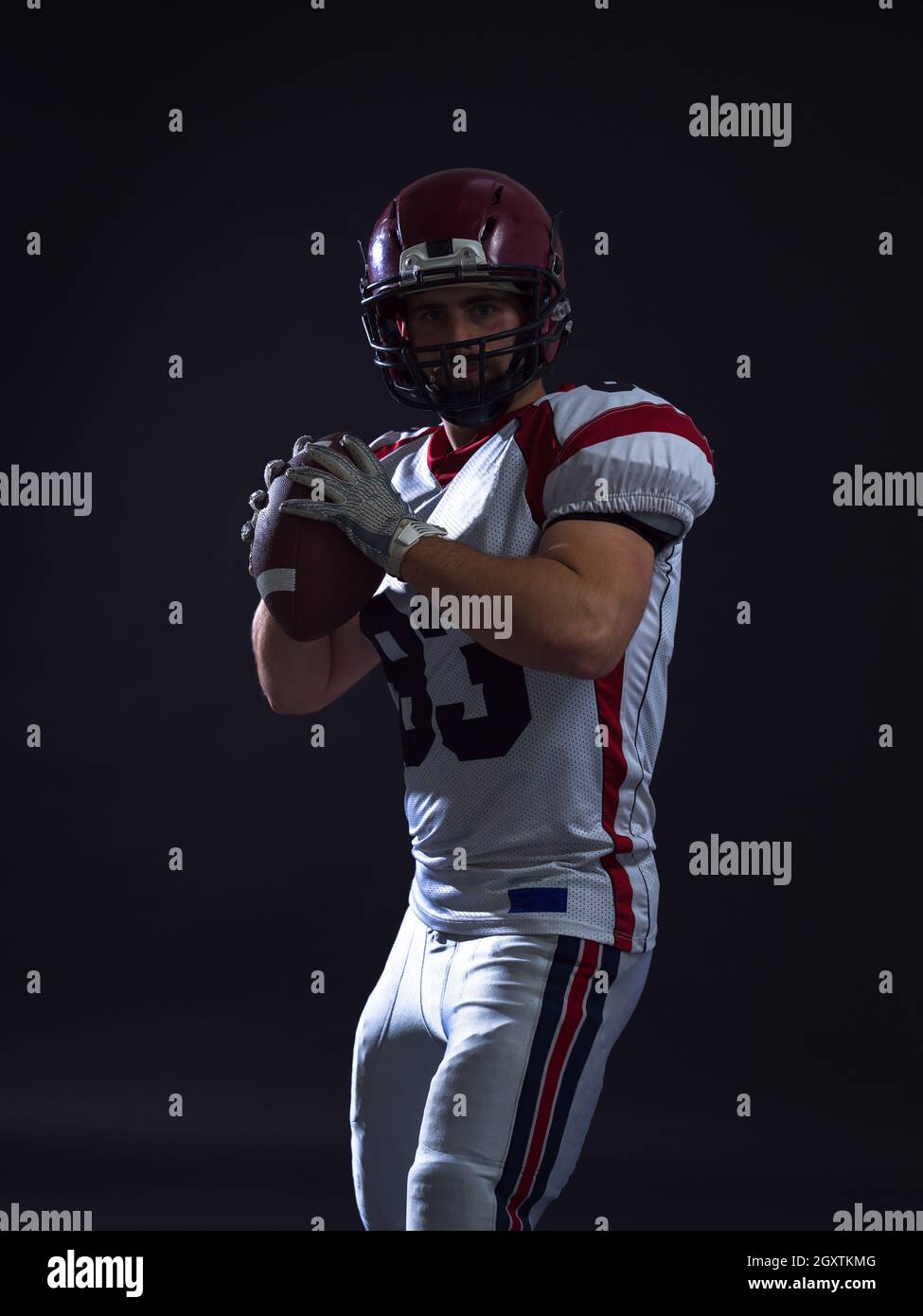 one quarterback american football player throwing ball isolated on gray ...