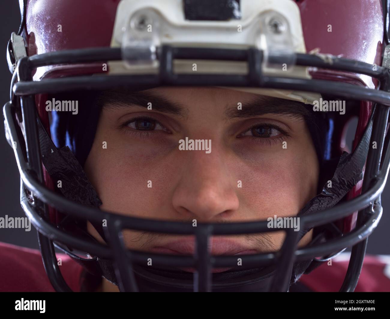 Closeup Portrait of a strong muscular American Football Player isolated ...