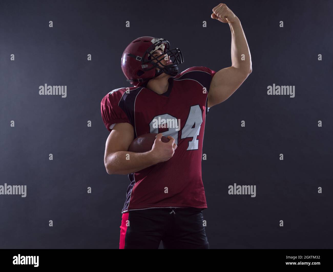american football player celebrating touchdown isolated on gray ...
