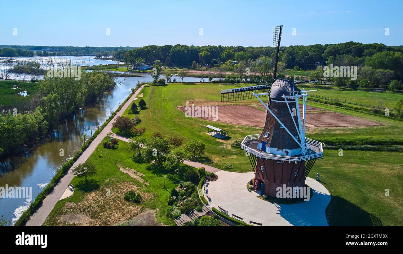 Windmill in America on water and swamp region Stock Photo - Alamy