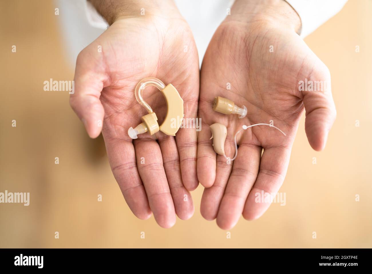 Medical Doctor With Hearing Aid Audiology Deaf Devices Stock Photo - Alamy