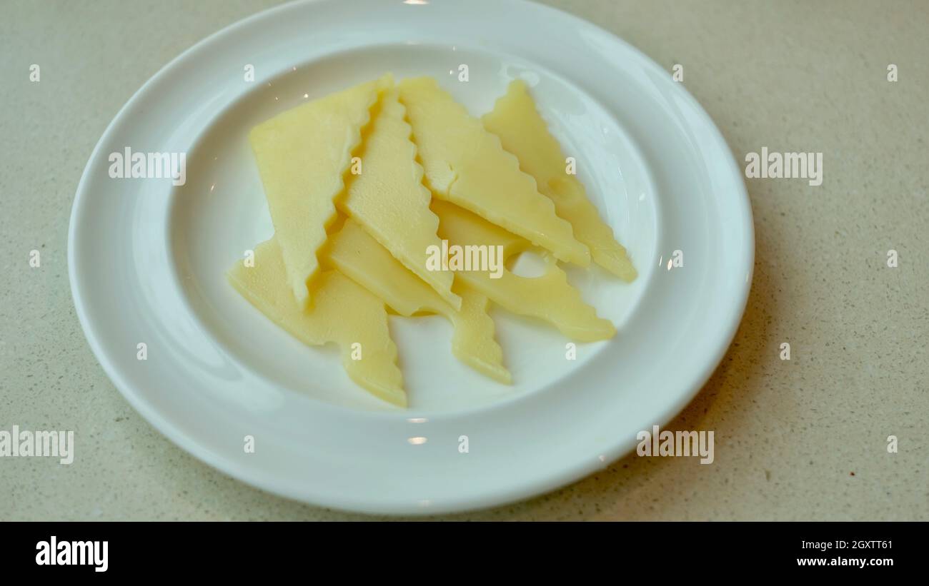Swiss Cheese Plate Stock Photo - Alamy