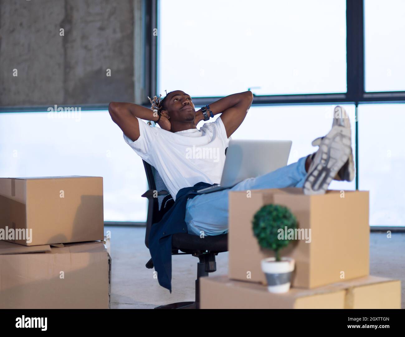 young african american male architect taking a break on construction ...