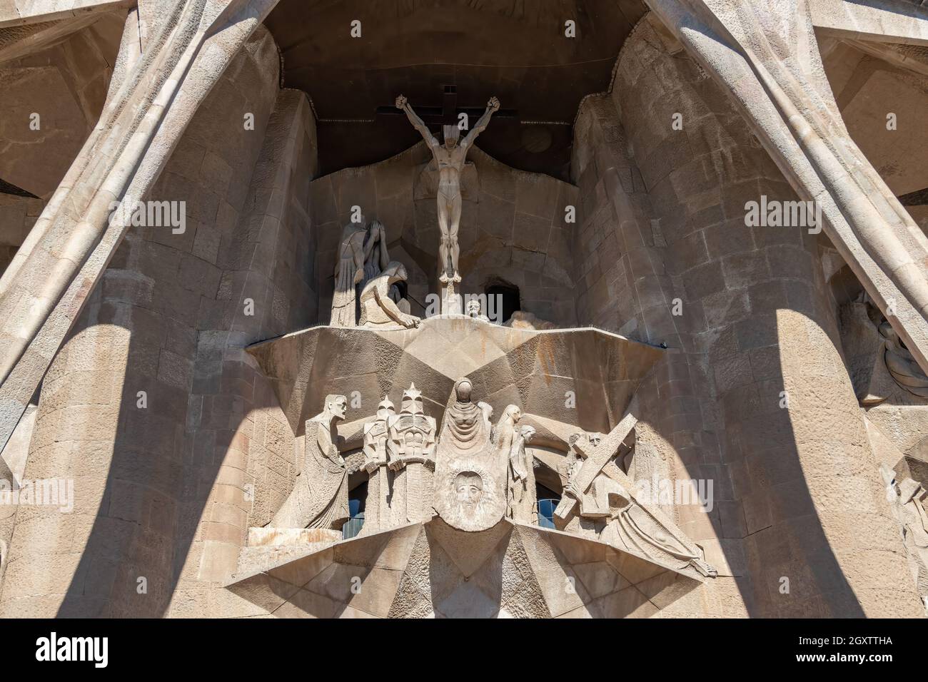 Detail of Christ Crucified on the facade of "La Sagrada Familia" in Barcelona, Sacred Family ...