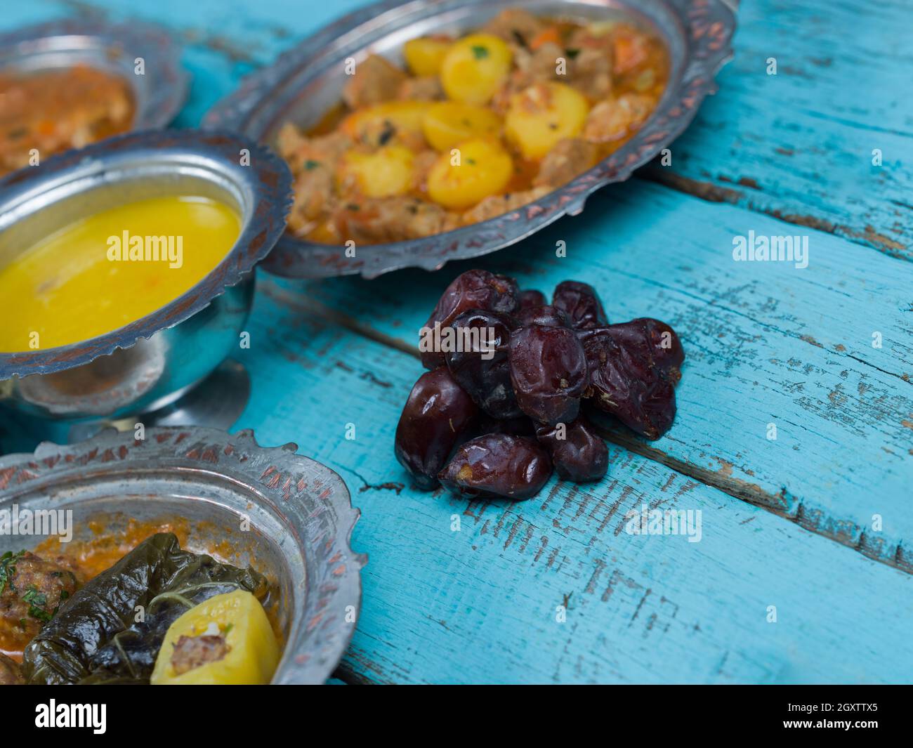 Eid Mubarak Traditional Ramadan Iftar dinner. Assorted tasty food in ...