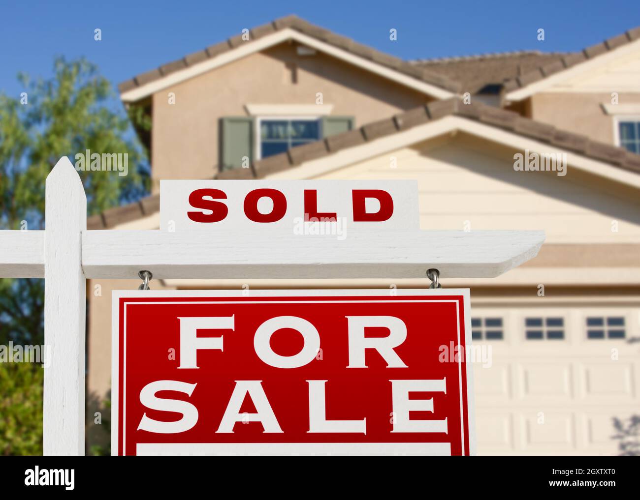 Sold Home For Sale Real Estate Sign and House Stock Photo - Alamy
