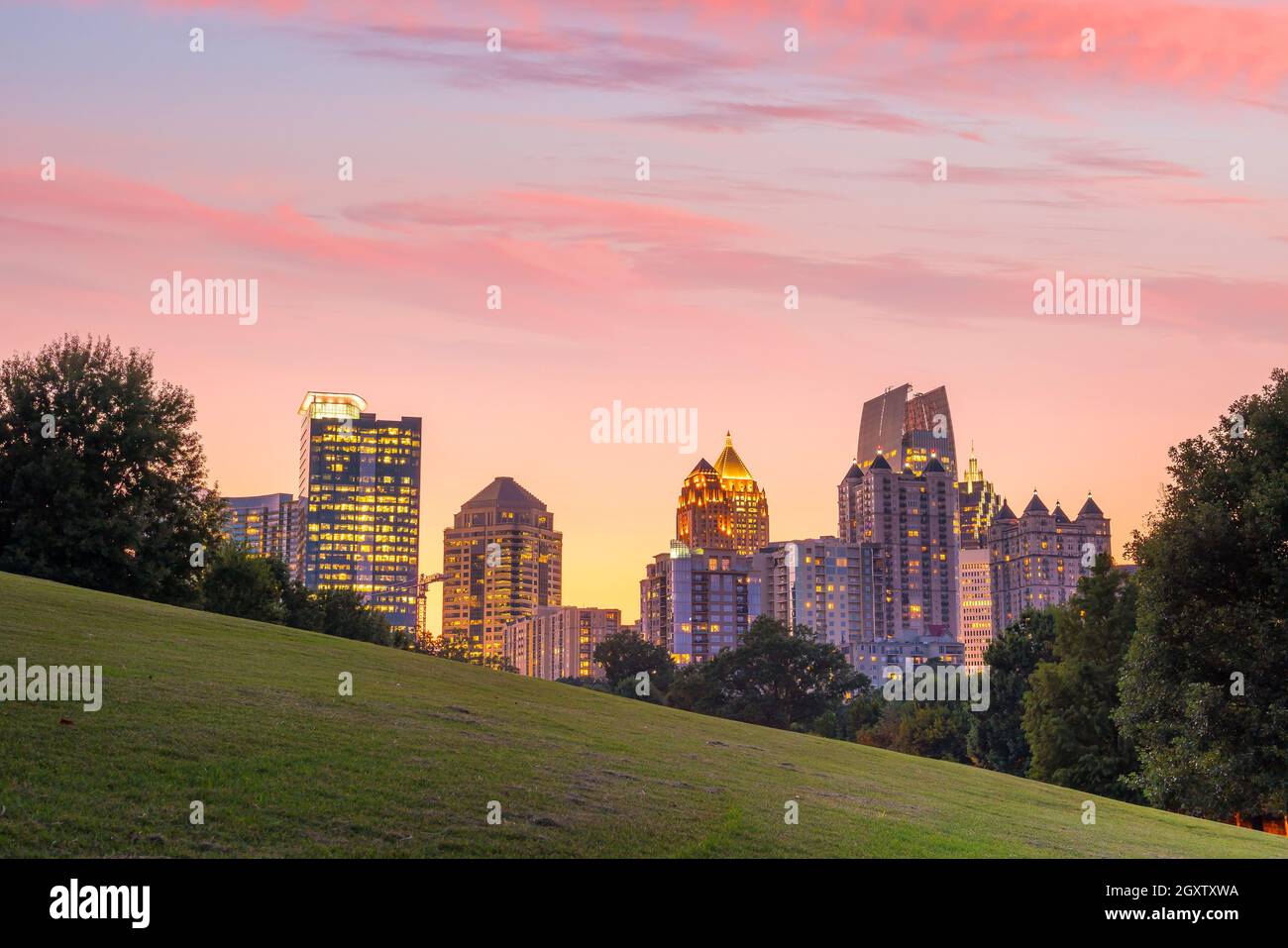 Midtown Atlanta skyline from the park at sunset Stock Photo - Alamy