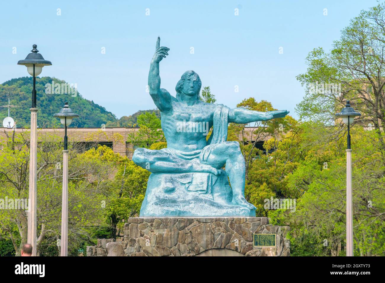 Peace Statue in Nagasaki Peace Park in Japan with blue sky Stock Photo ...