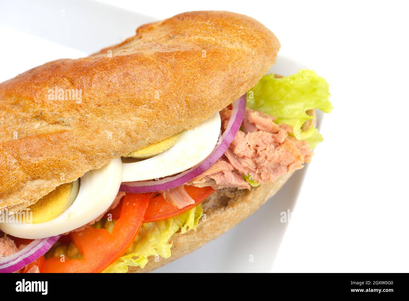 fresh sandwich close up with vegetables and meat fish isolated on white ...