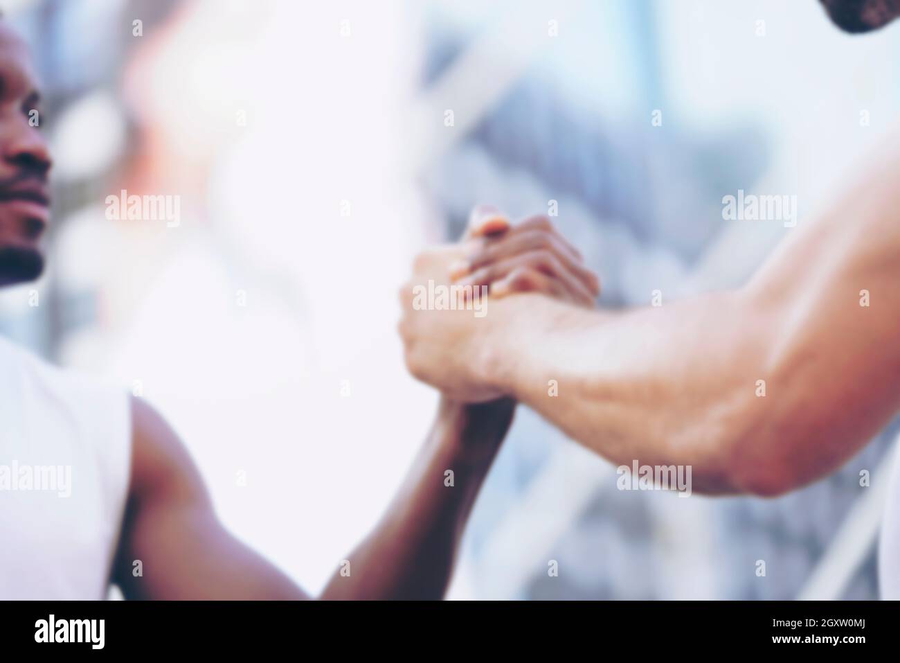 blurred Successful sport man handshaking after match. Handshake ...