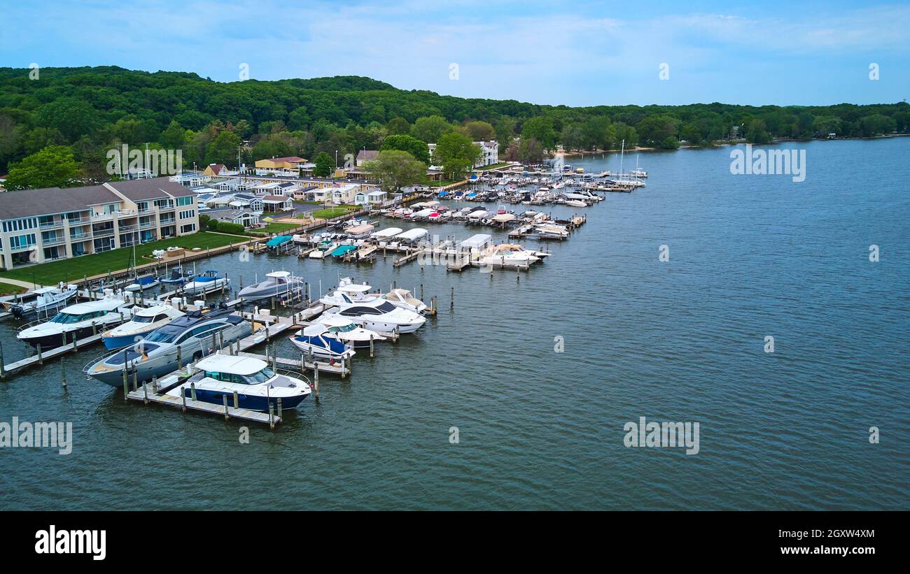 Dock filled with boats from aerial view on lake Stock Photo - Alamy