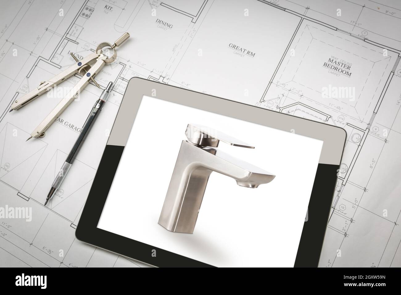 Computer Tablet Showing Custom Faucet On House Plans, Pencil, Compass ...