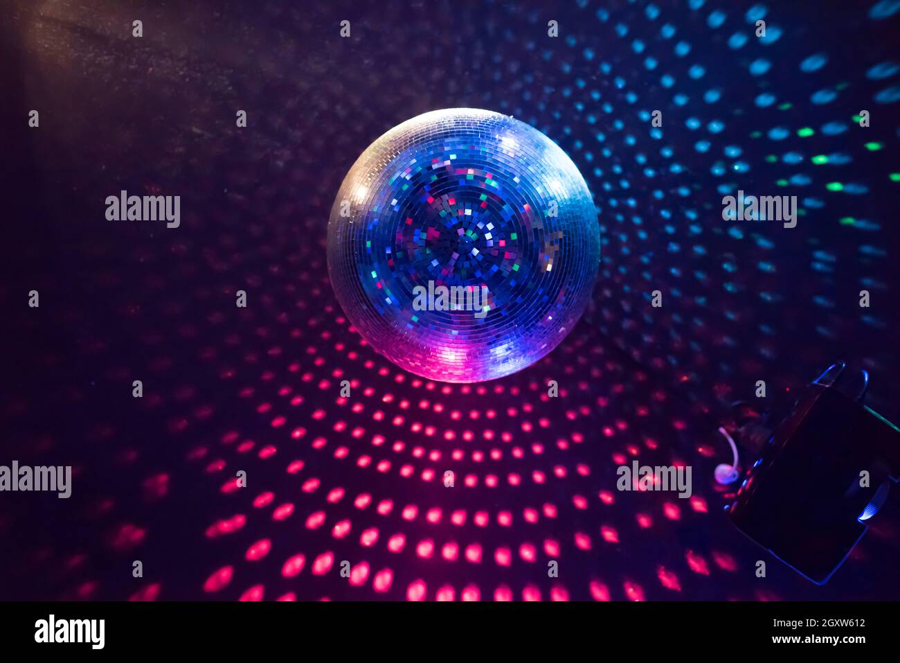 Disco ball light reflection background Stock Photo - Alamy