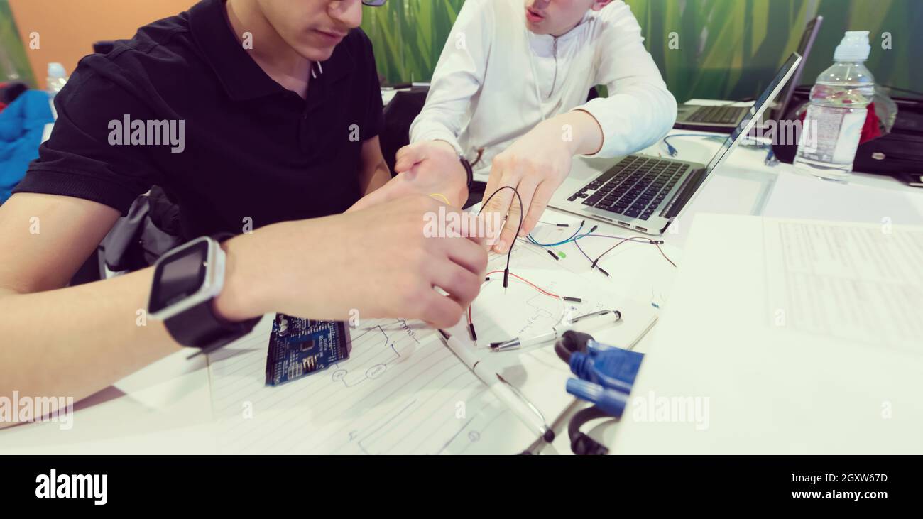 it students in computer science classroom working together on project ...