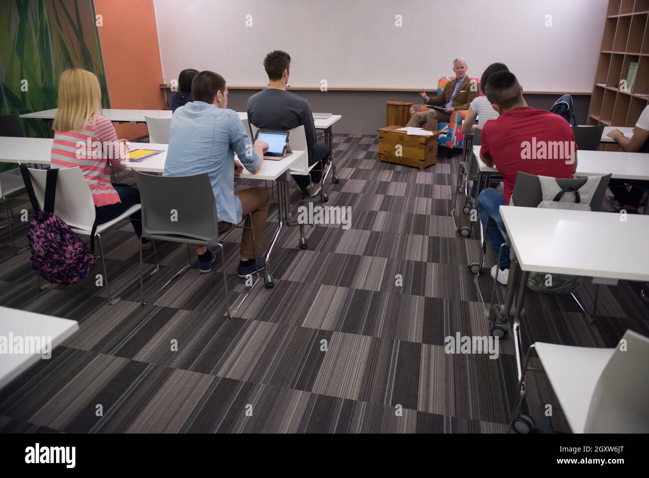 group of students study with professor in modern school classroom Stock ...