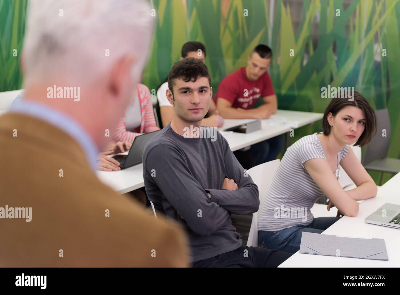 group of students study with professor in modern school classroom Stock ...