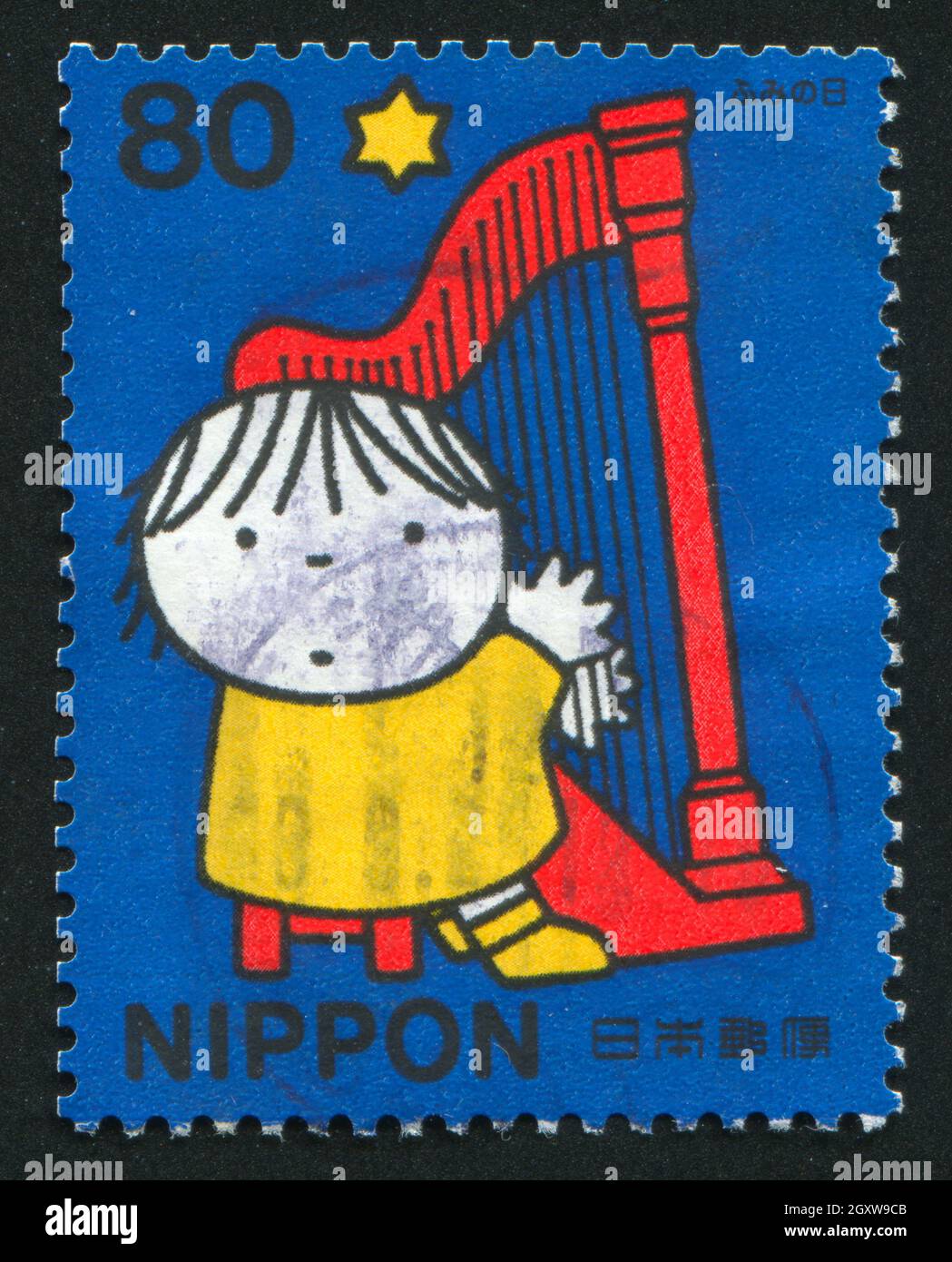 JAPAN - CIRCA 1998: stamp printed by Japan, shows Child playing harp ...