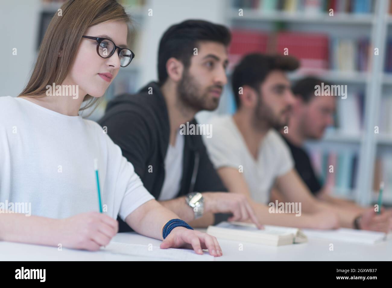 students group study together in school classroom and working together ...