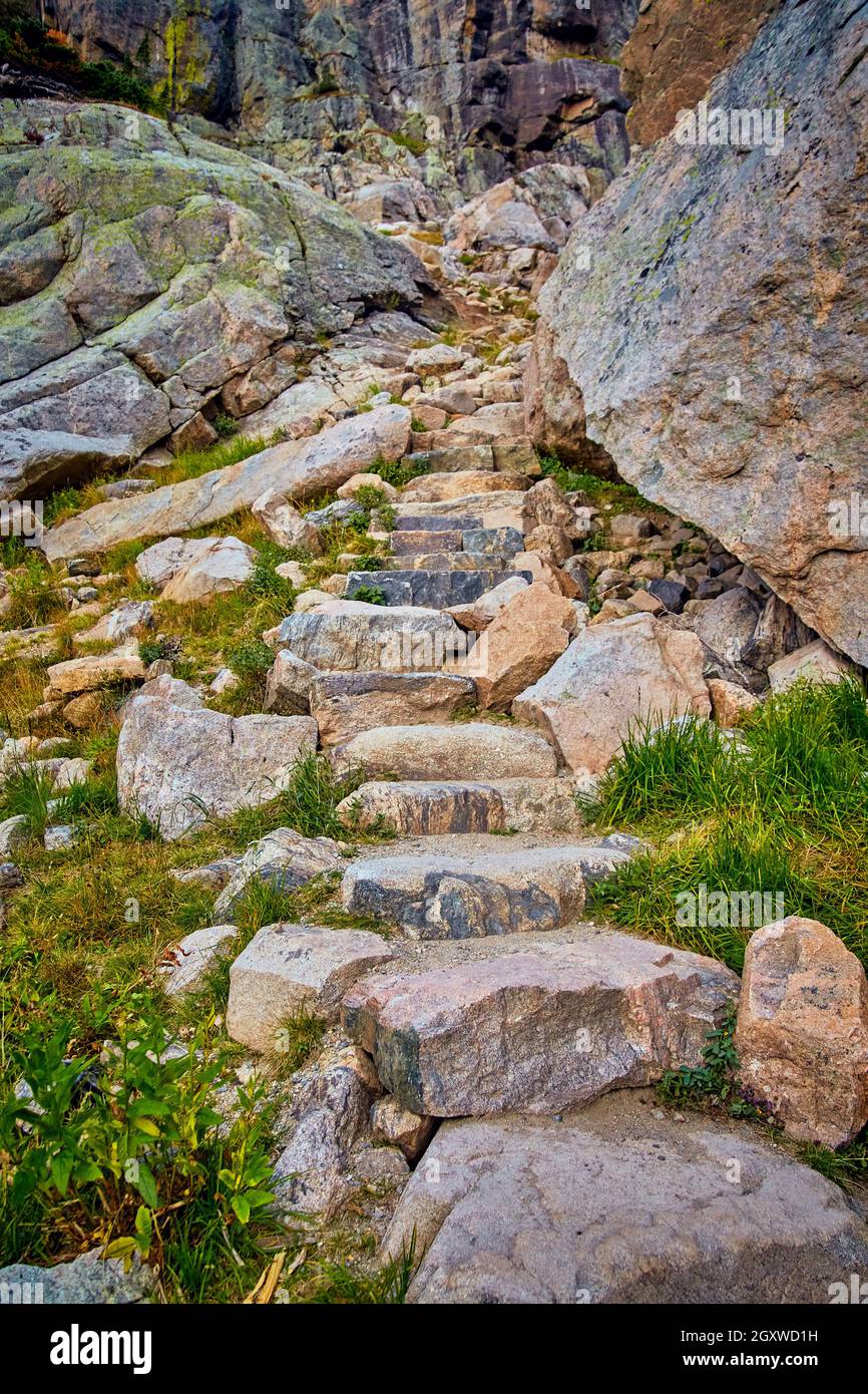 Stone steps walking hiking path up mountain Stock Photo - Alamy