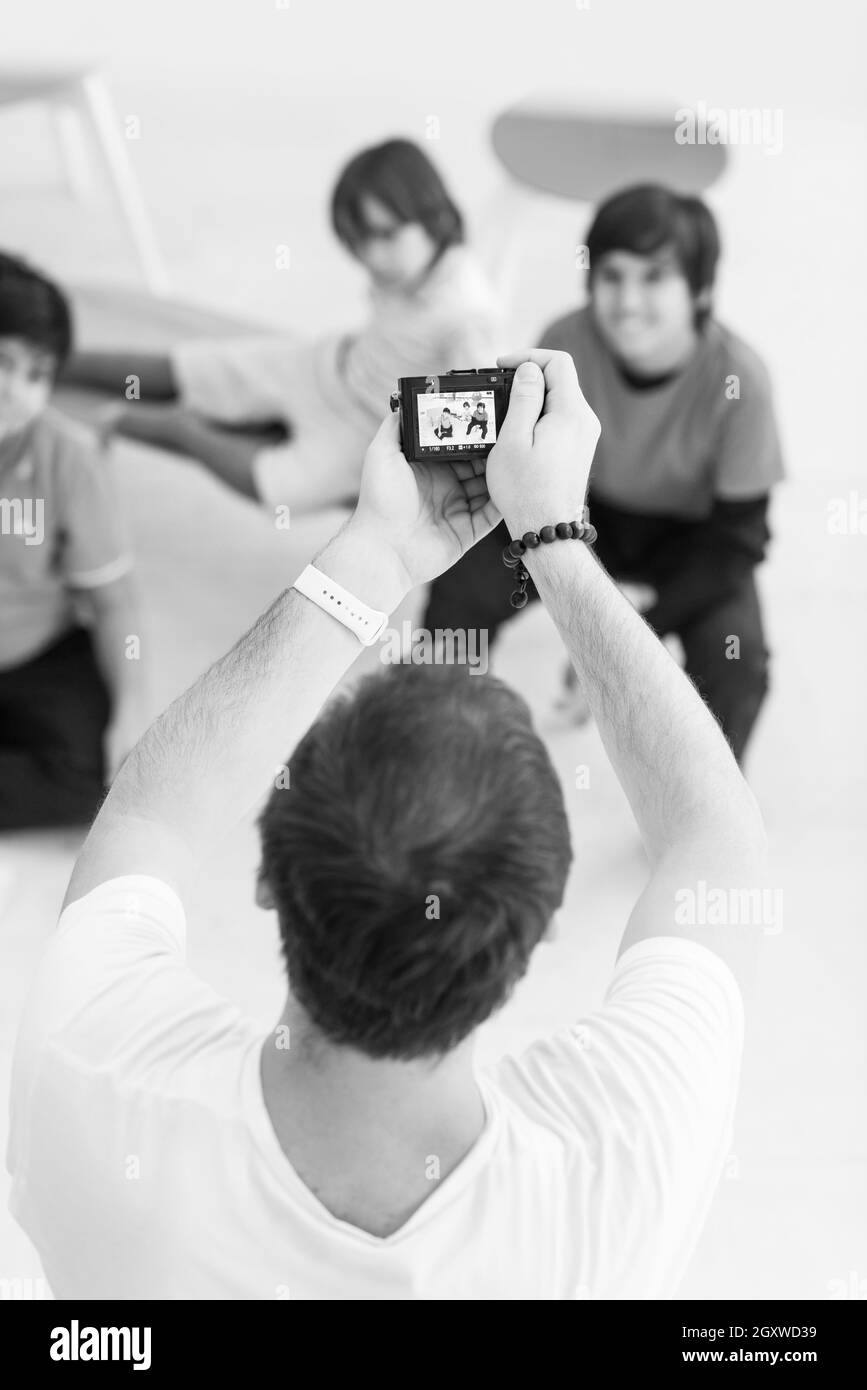 Photoshooting with kids models at studio as new modern home Stock Photo ...