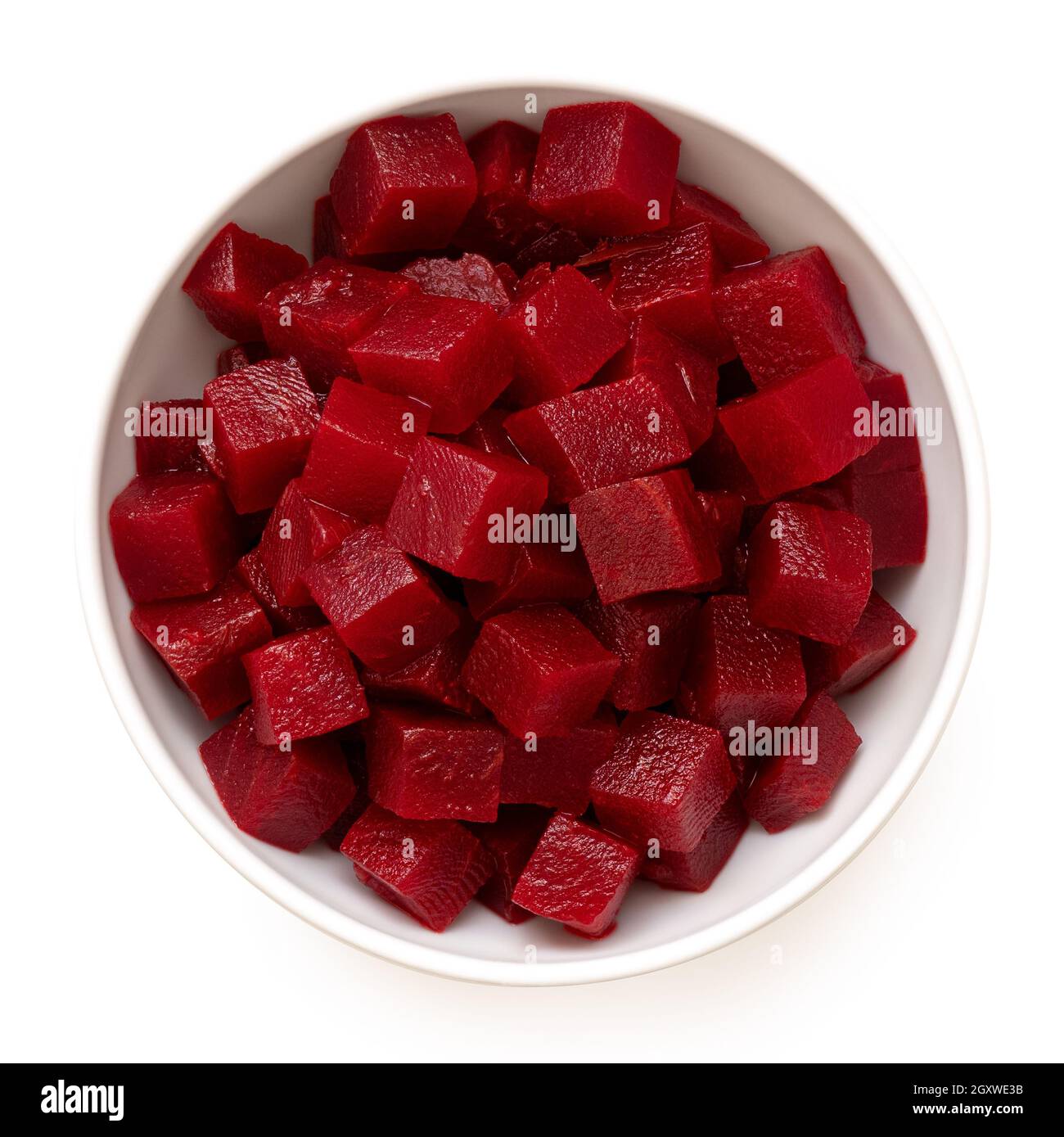 Cooked chopped beetroot in white ceramic bowl isolated on white. Top ...