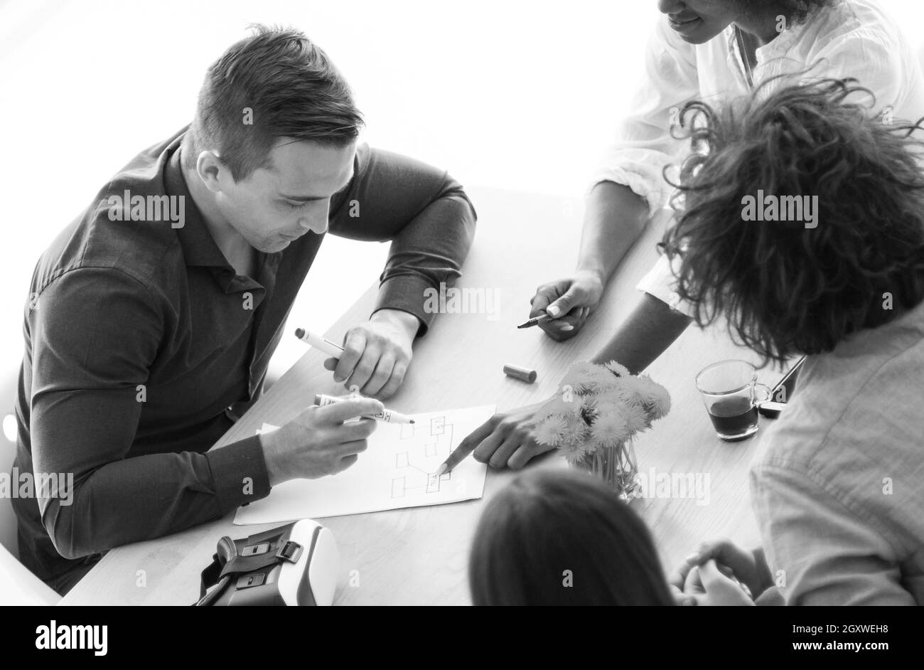 Young team talking about the problem at work Stock Photo - Alamy