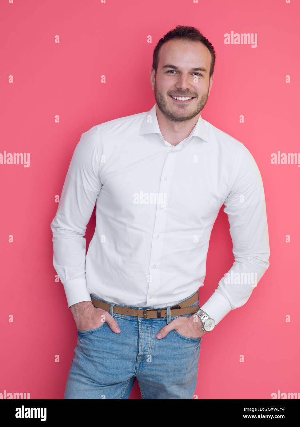 portrait of a handsome young man isolated over a red background Stock ...