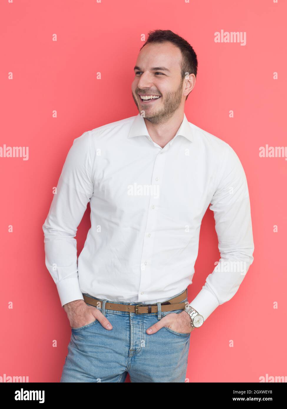 portrait of a handsome young man isolated over a red background Stock ...