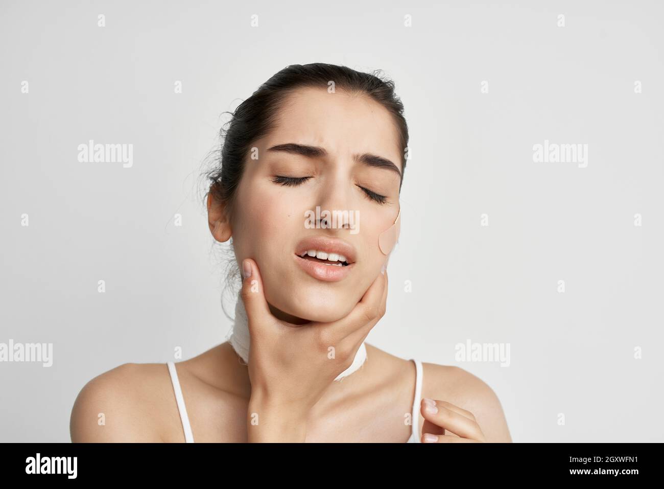 brunette patch on the face pain depression isolated background Stock ...