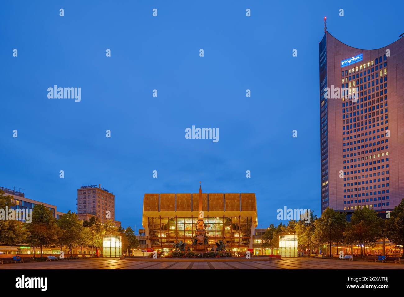 Downtown in Leipzig in evening blue hour light with the The Mende ...
