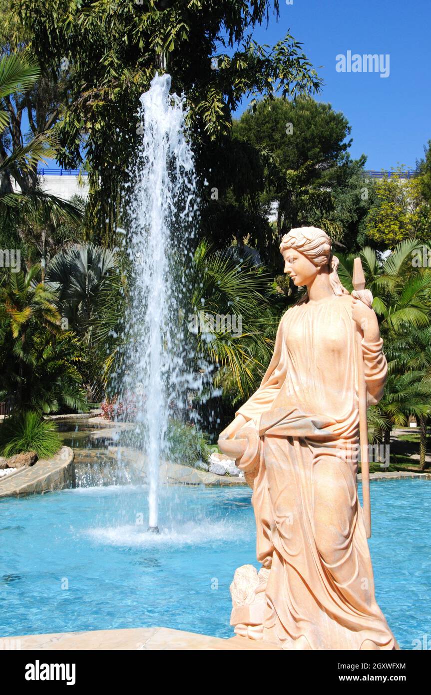 Winter statue with fountain, pool and mill to the rear, Molina de Inca ...