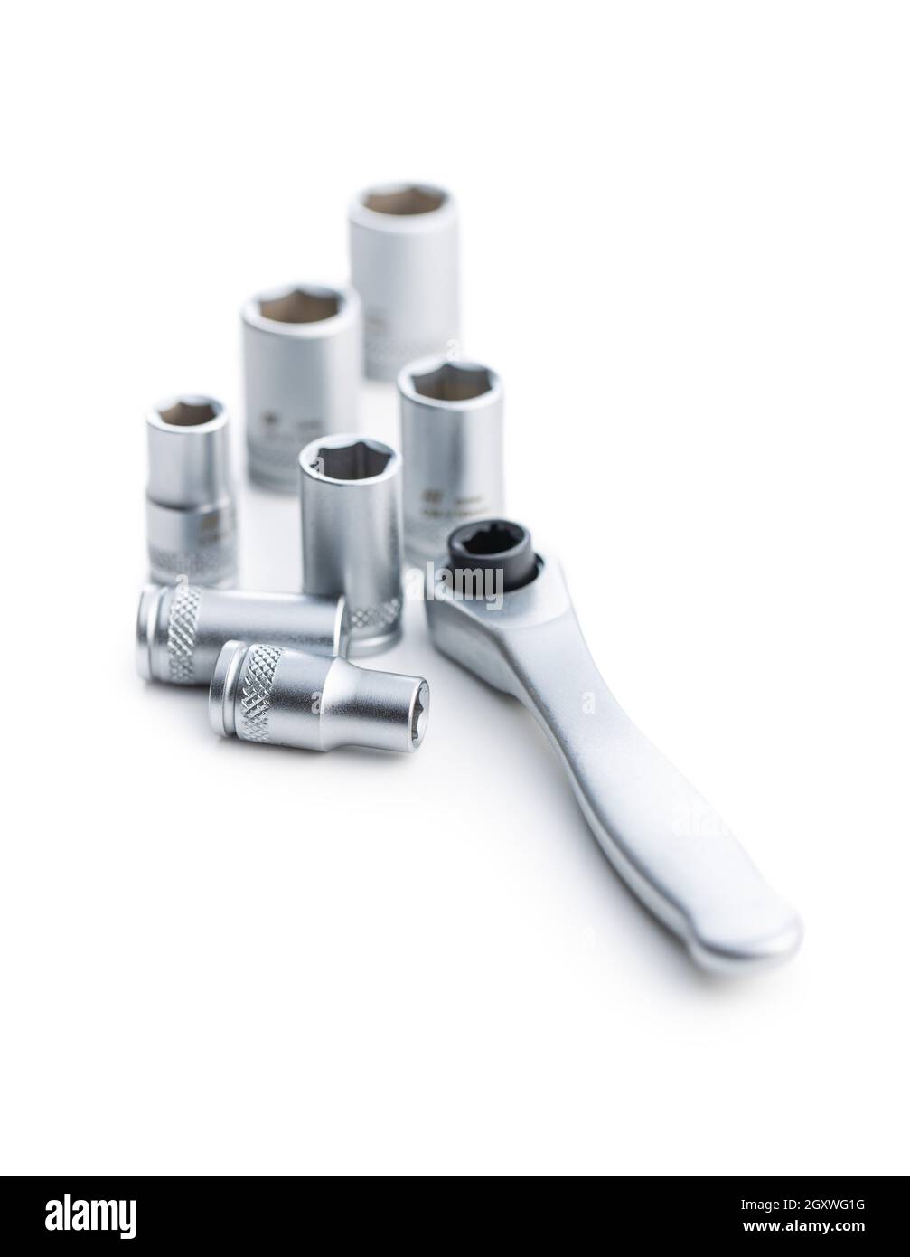 Mini ratchet wrench with set of wrench nuts isolated on white ...