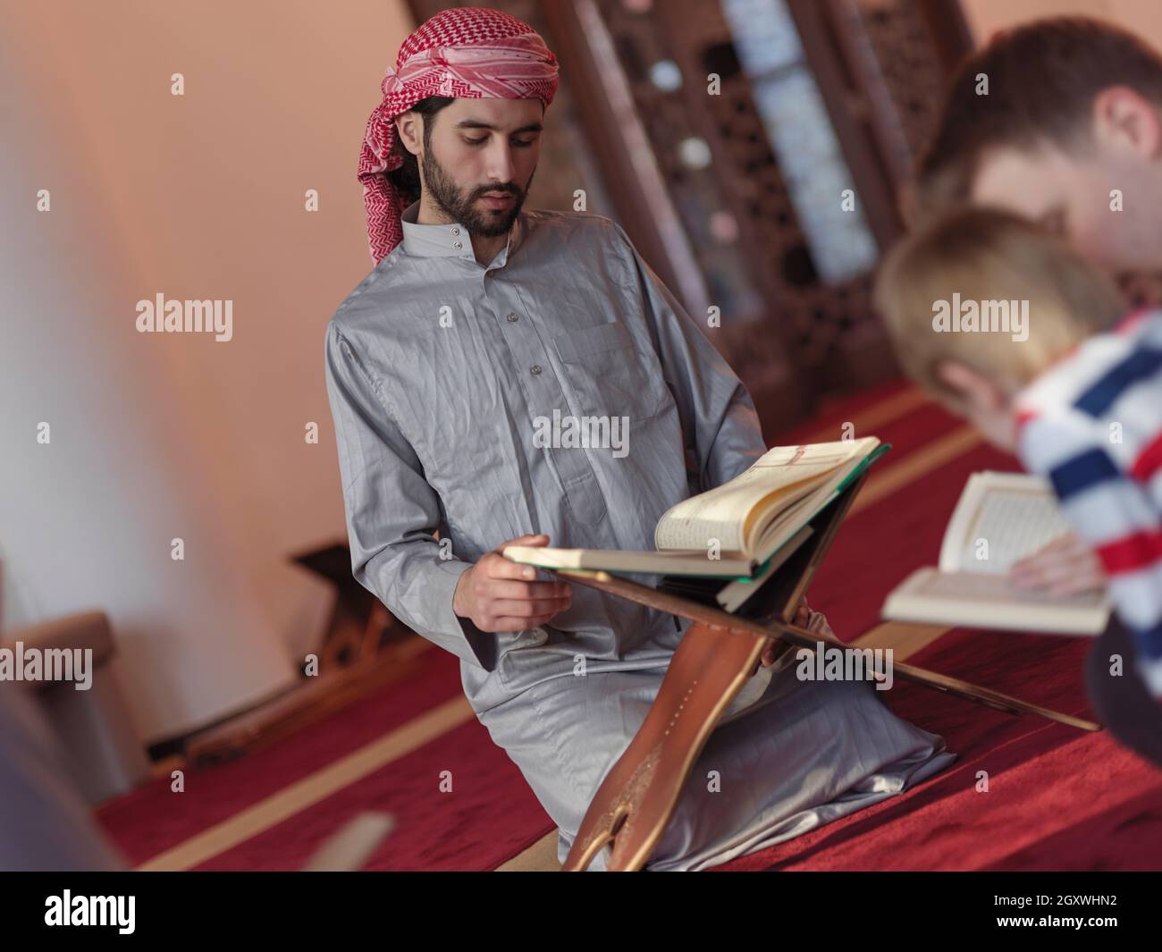 muslim people in mosque reading quran together concept of islamic ...