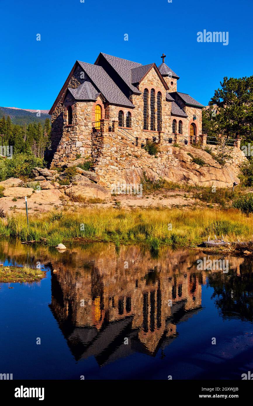 Vertical of pond with church building reflection in desert Stock Photo ...