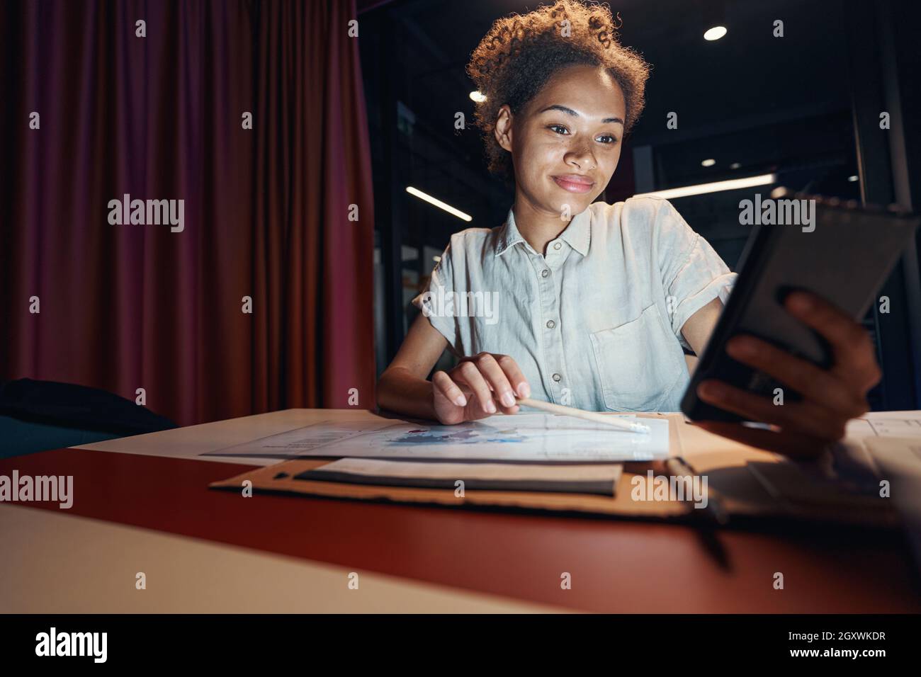 Female person searching information for meeting with partners Stock ...