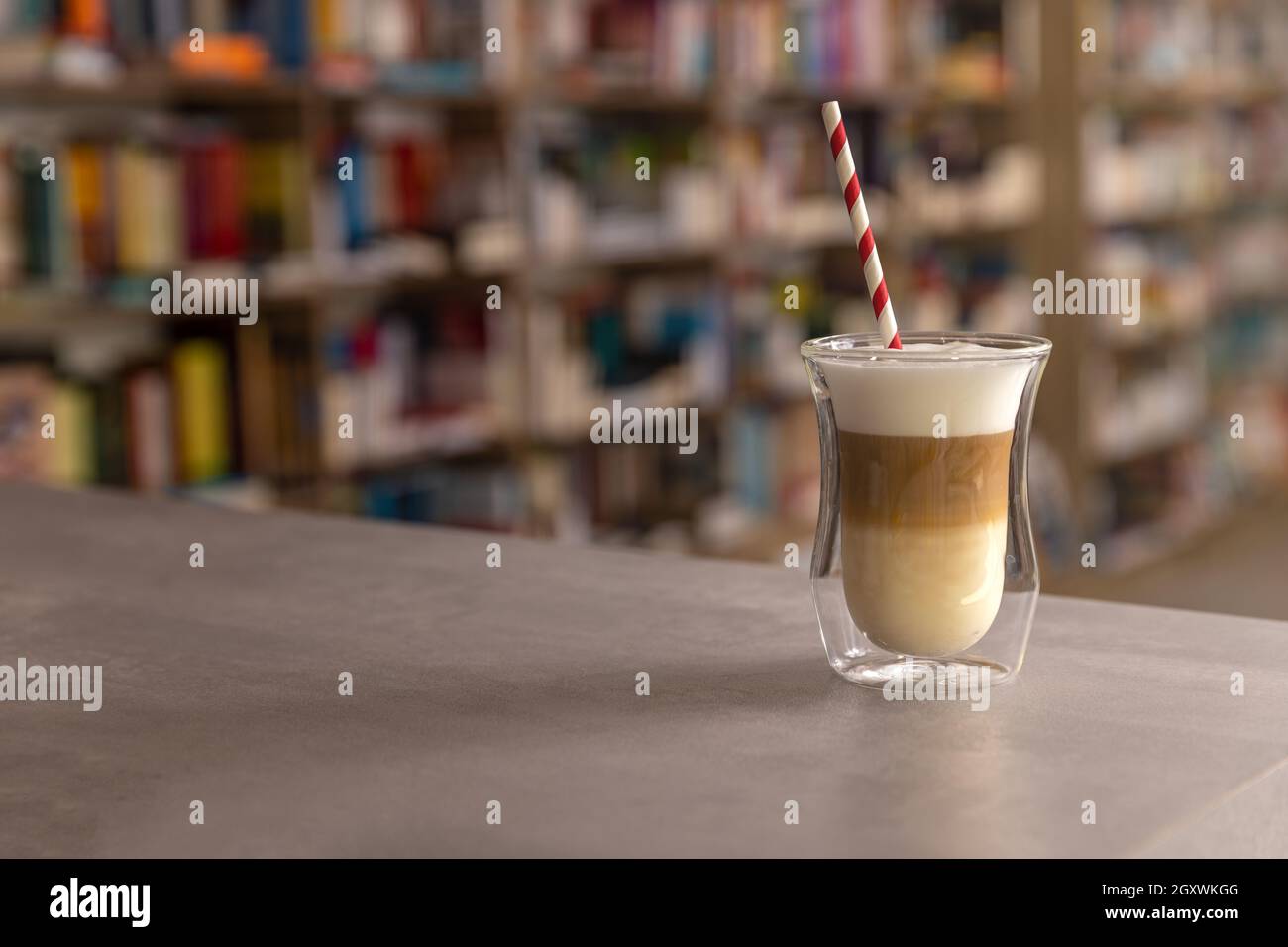 Cafe latte layered with milk in a high drinking glass Stock Photo - Alamy