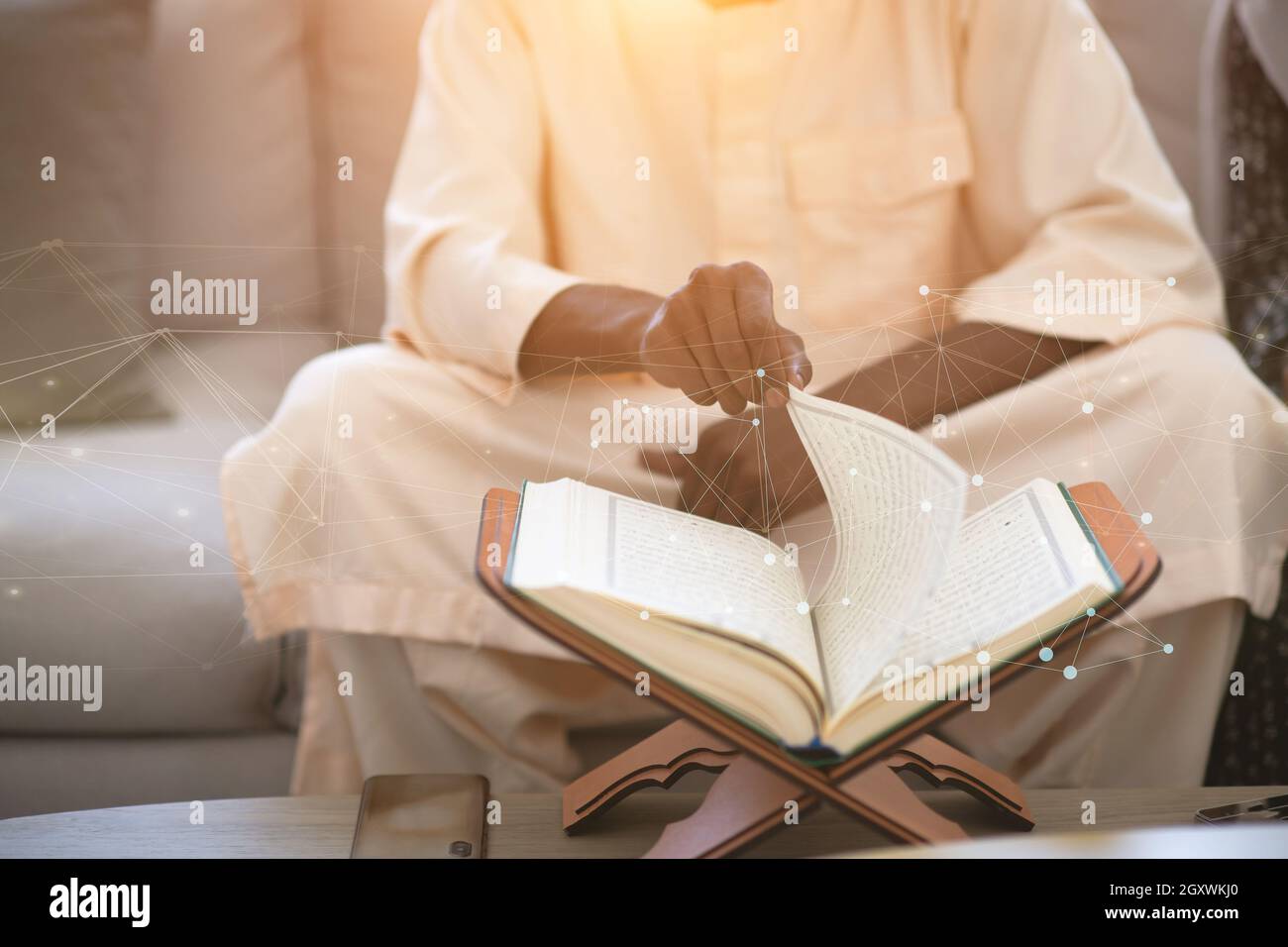 african muslim couple at home in ramadan reading quran holly islam book ...