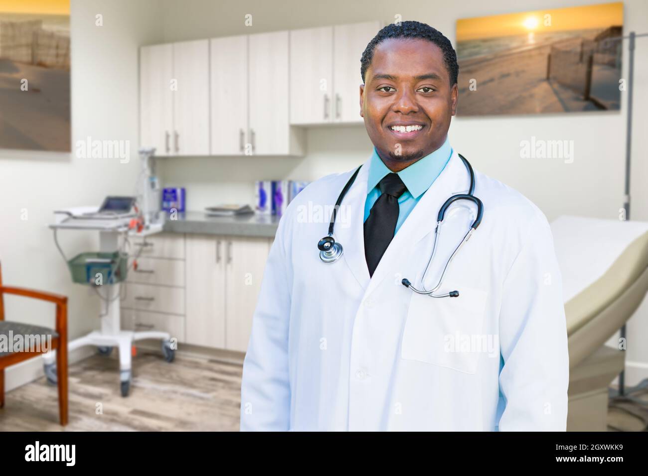 African American Male Doctor Standing In Office Stock Photo - Alamy