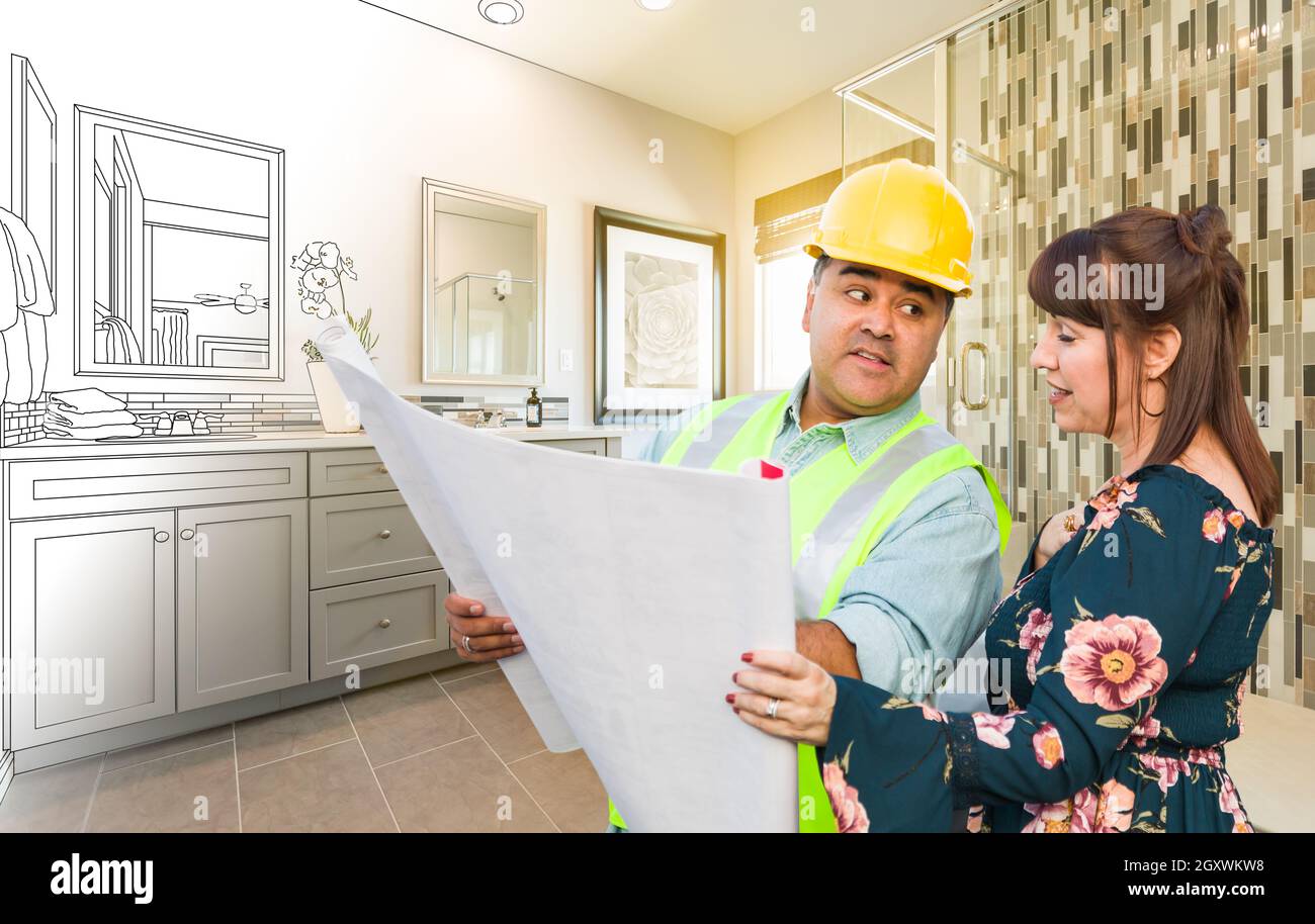 Hispanic Male Contractor Talking with Female Client Over Blueprint ...