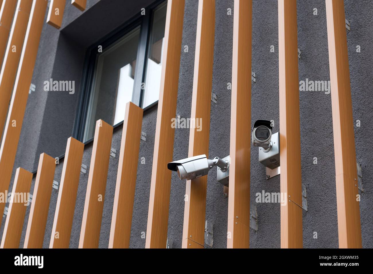 Security cameras on modern building. Professional surveillance camera ...