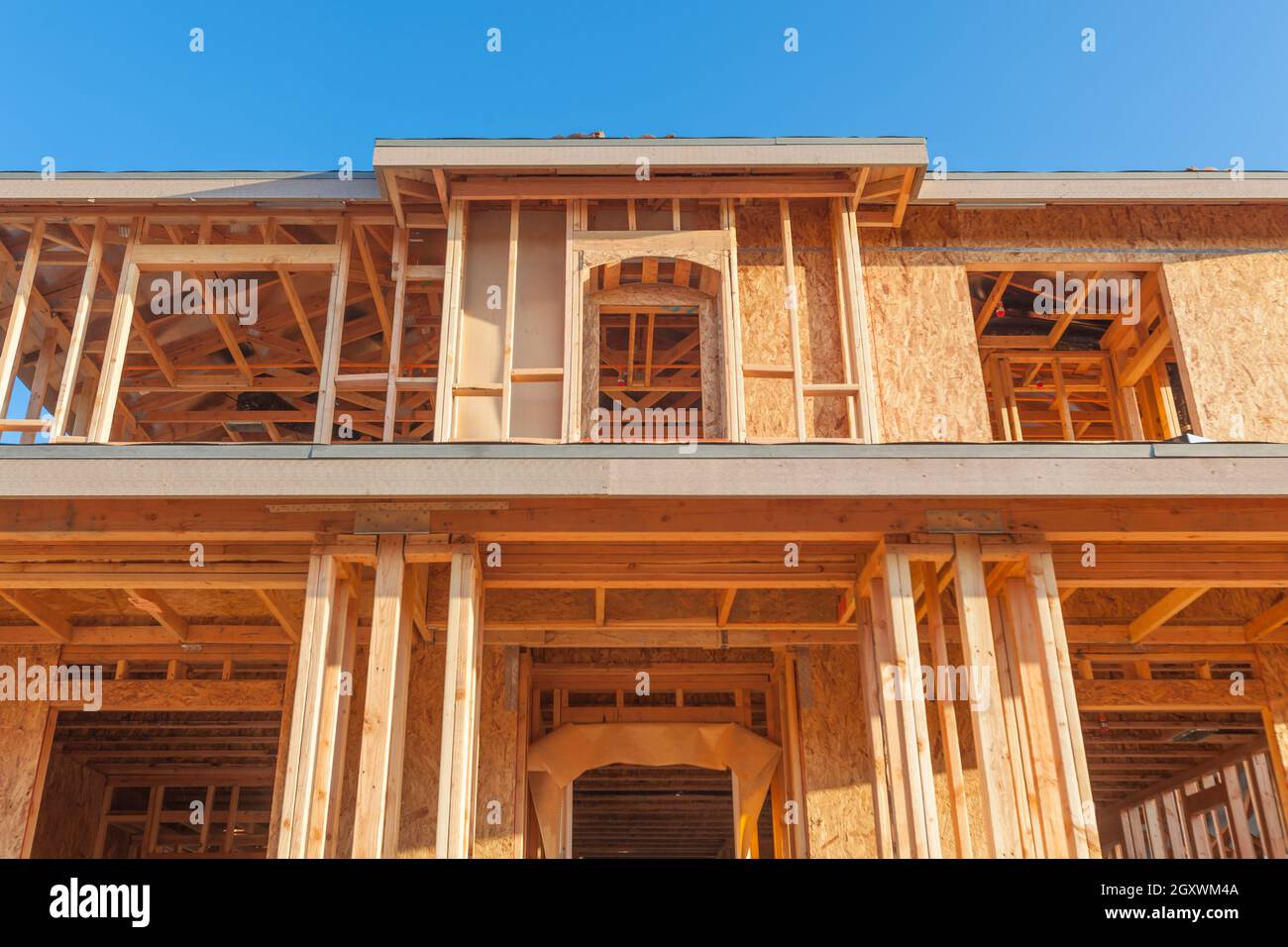 New Wood House Framing at Construction Site Stock Photo - Alamy