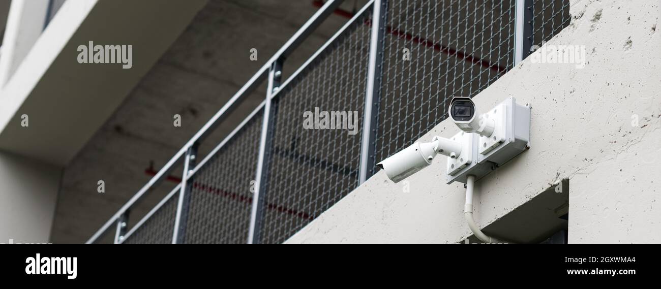 Security cameras on modern building. Professional surveillance camera ...