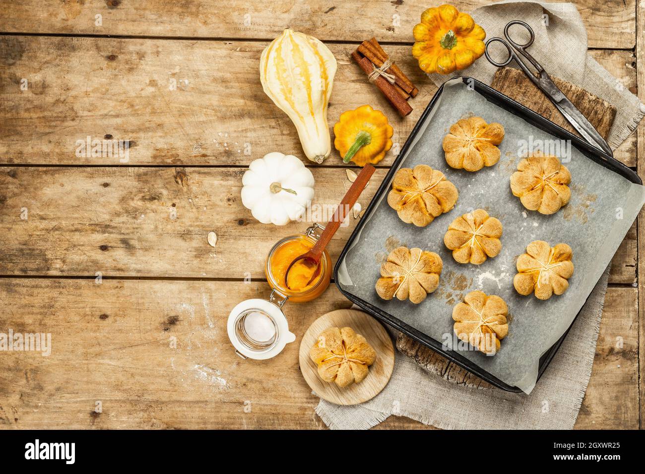 Pumpkin buns or biscuits, traditional fall baked goods. Seasonal ...
