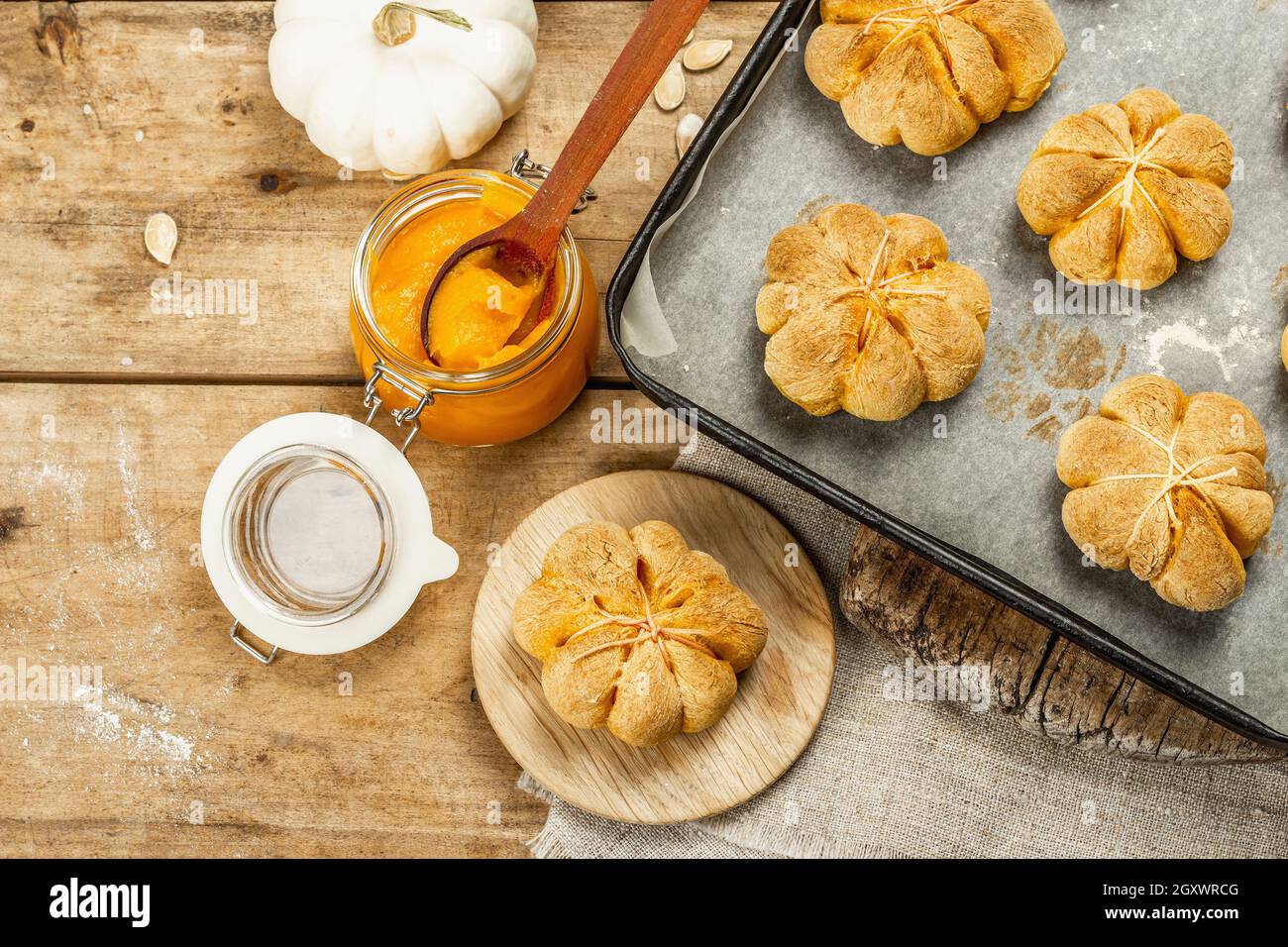 Pumpkin buns or biscuits, traditional fall baked goods. Seasonal ...