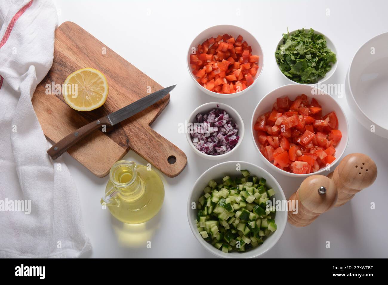 White bowls with grated vegetables of different colors. Cooking board ...